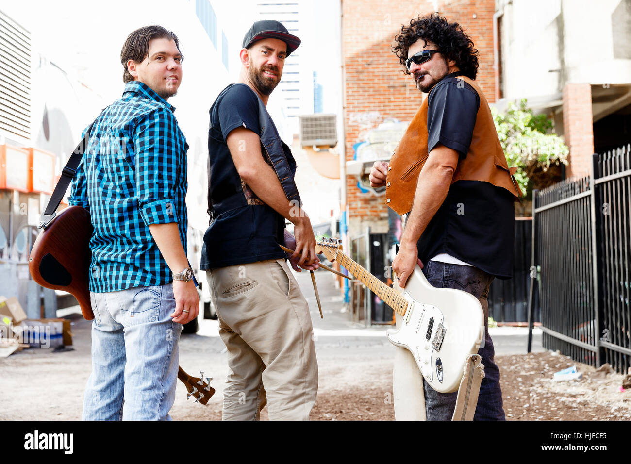 Musicians walking hi-res stock photography and images - Alamy