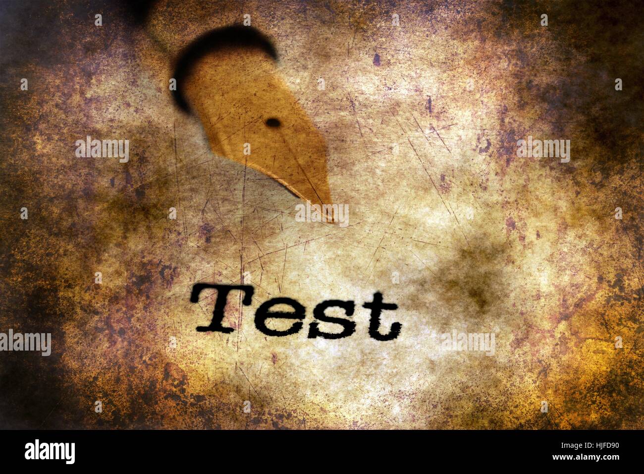 Fountain pen on test grunge concept Stock Photo - Alamy