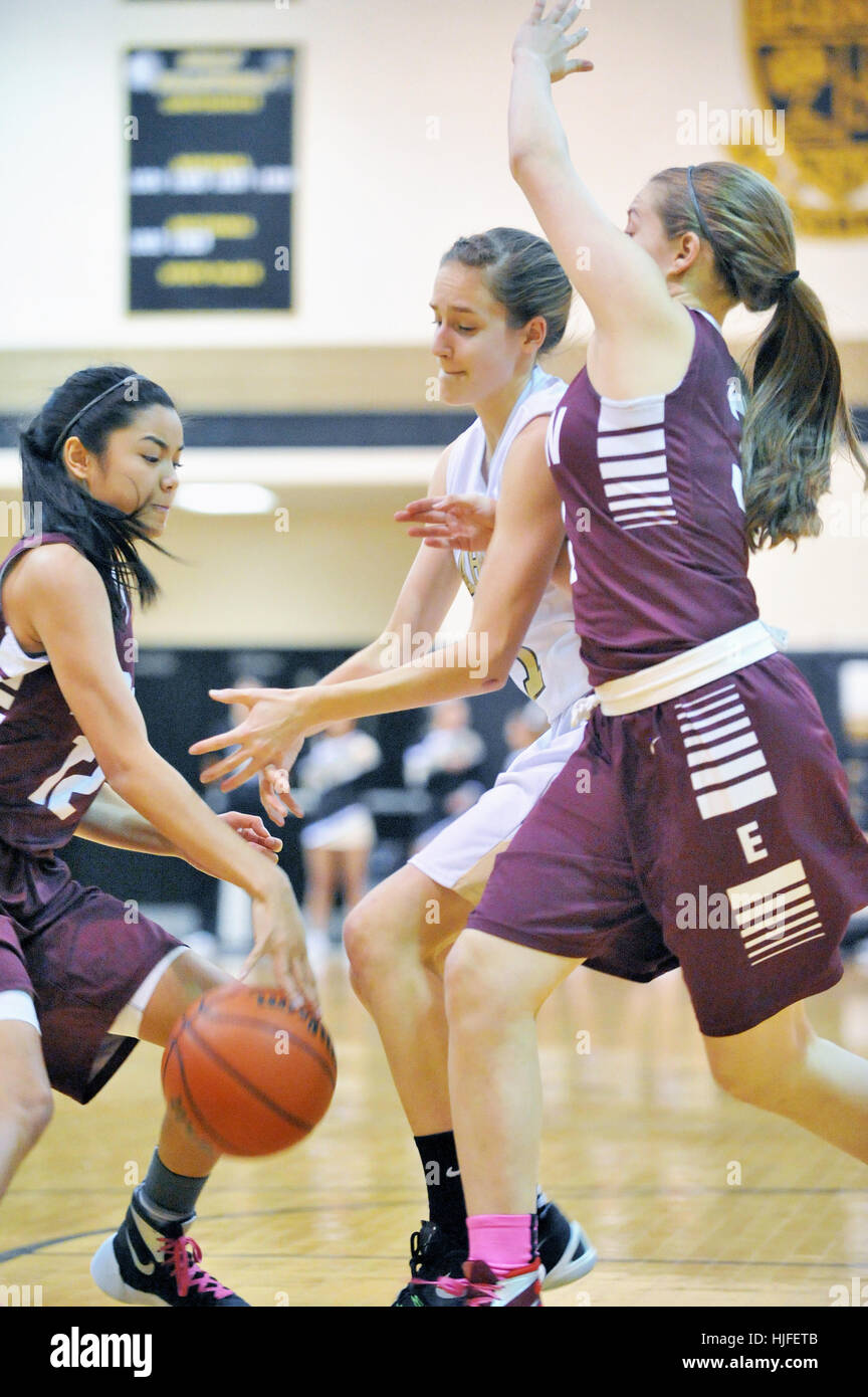 While driving on the hoop a high school player lost control of the ...