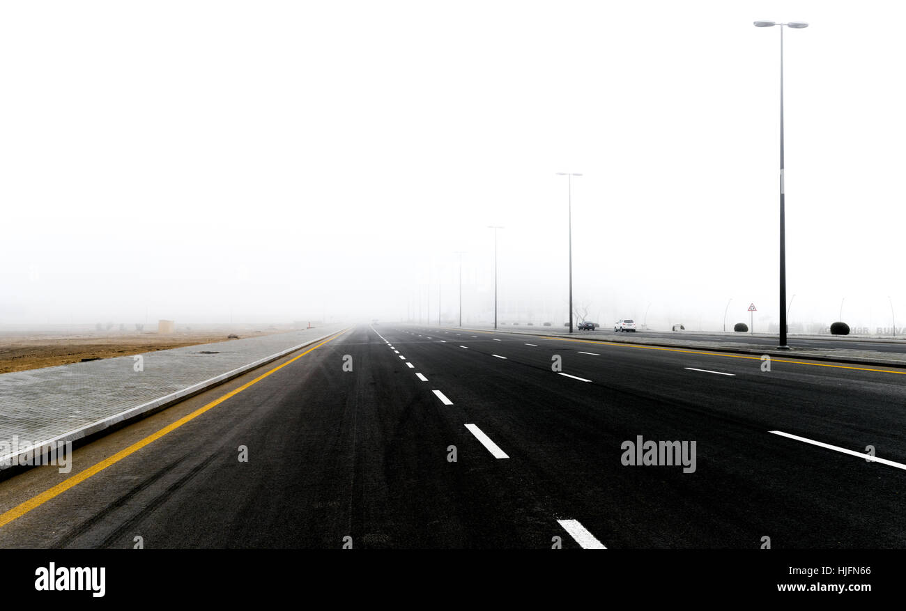 Road signs fog hi-res stock photography and images - Alamy
