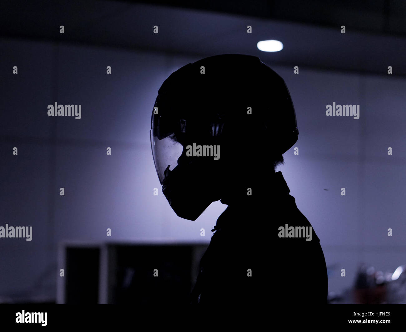 Shadow man wearing protective hi-res stock photography and images - Alamy