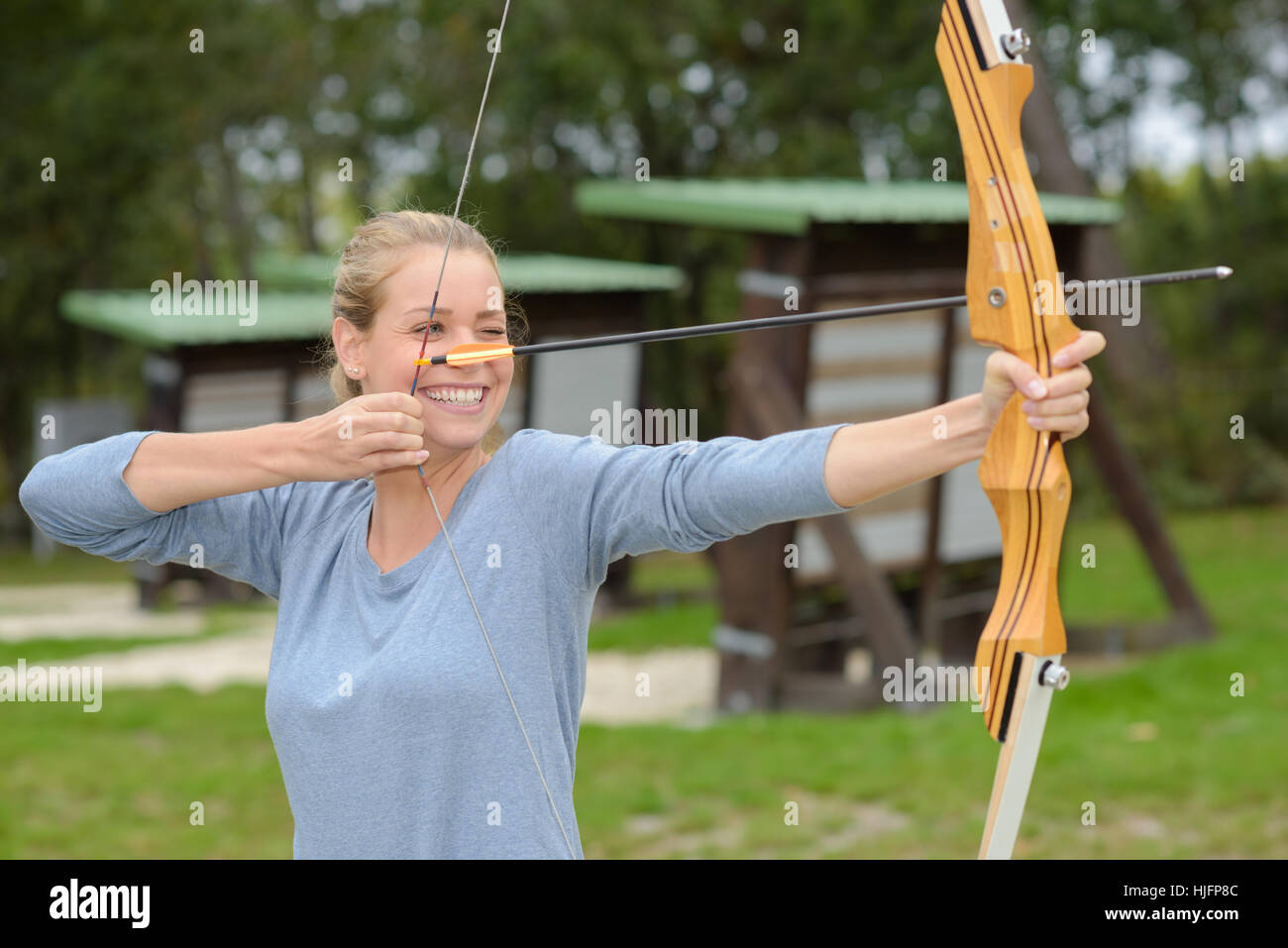 young archer smiling Stock Photo - Alamy