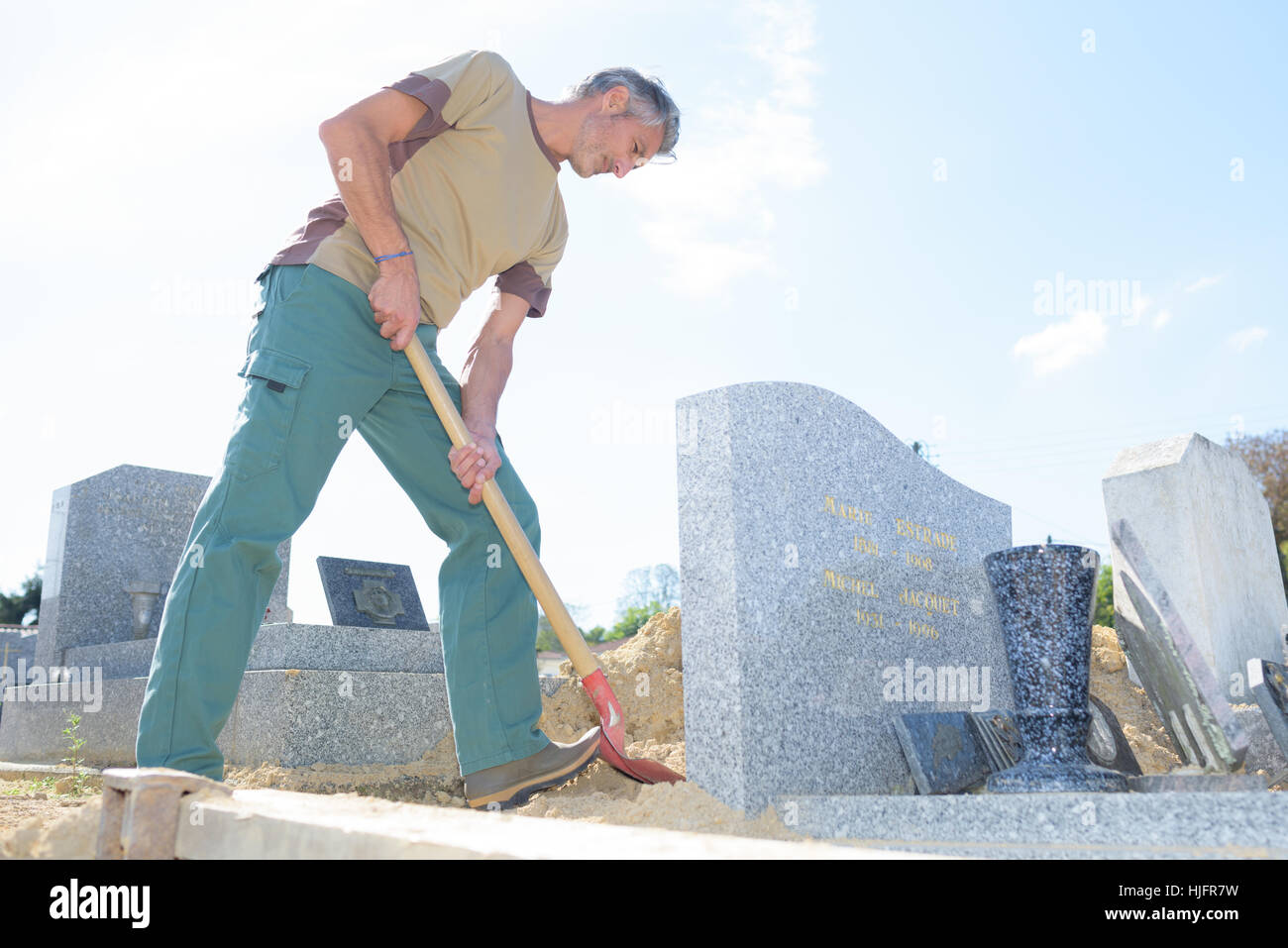 groundskeeper in cemetary Stock Photo - Alamy