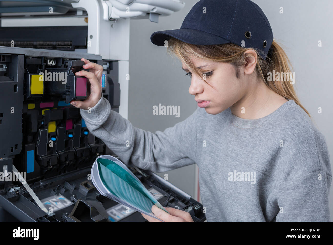 Worker reading manual hi-res stock photography and images - Alamy