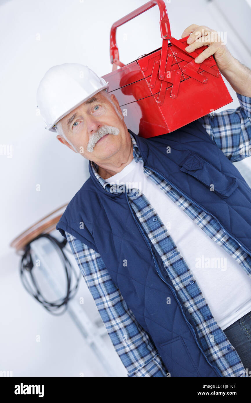 worker and tool box Stock Photo - Alamy