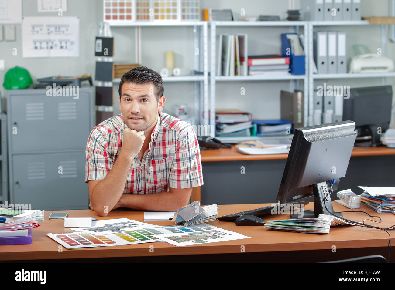 Relaxed office worker Stock Photo - Alamy