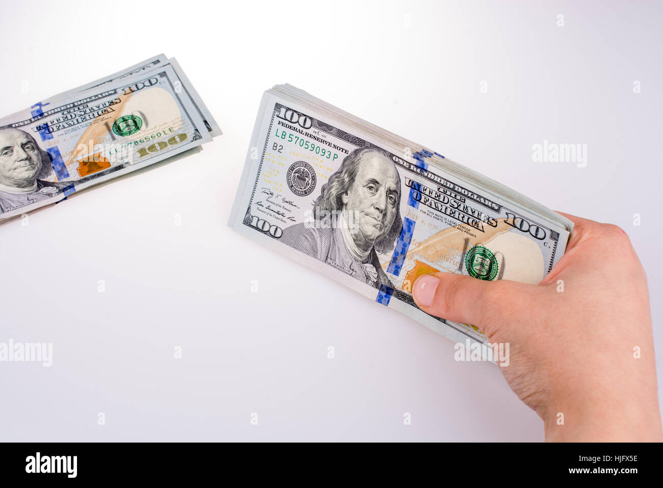 Human hand holding American dollar bill as money isolated on white ...