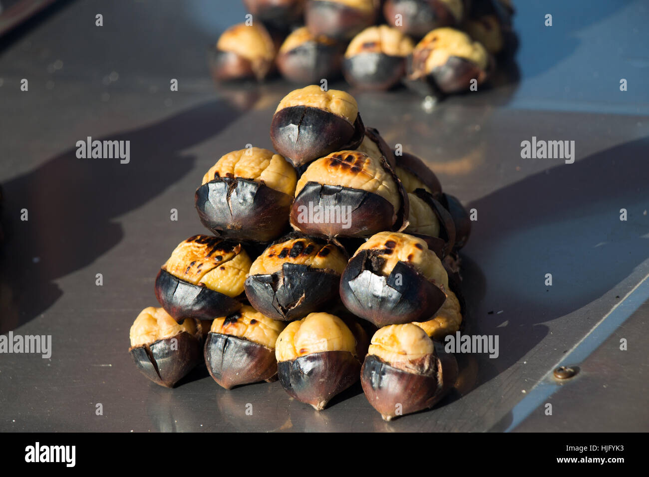 Roasted chestnuts cooked over fire hi-res stock photography and images ...