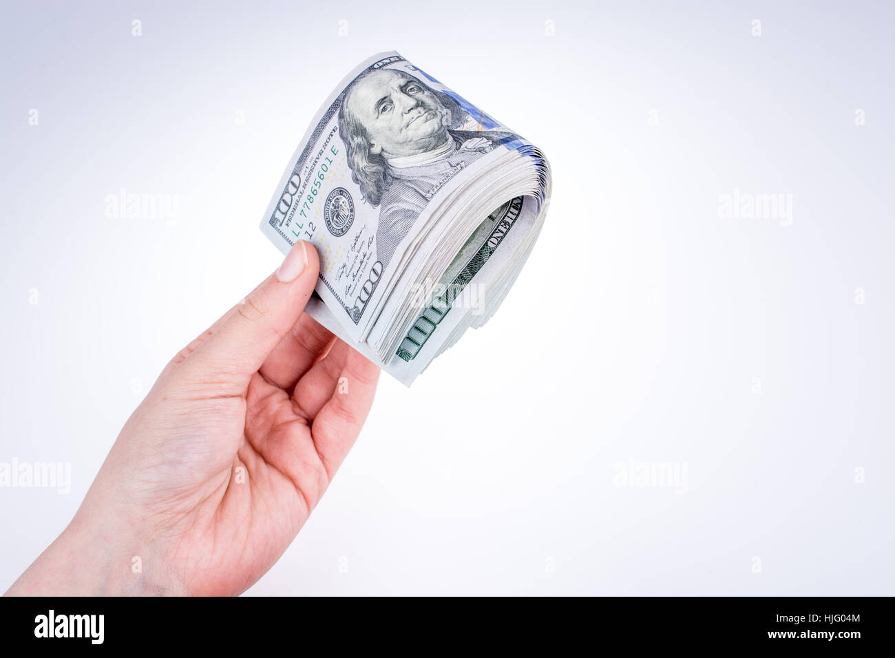 Human hand holding American dollar bill as money isolated on white ...