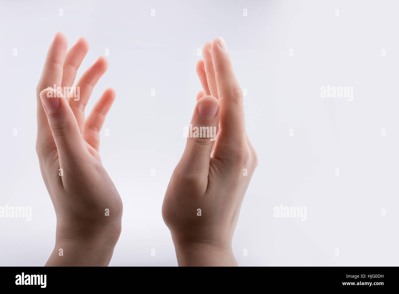 Hand holding on a white background Stock Photo - Alamy
