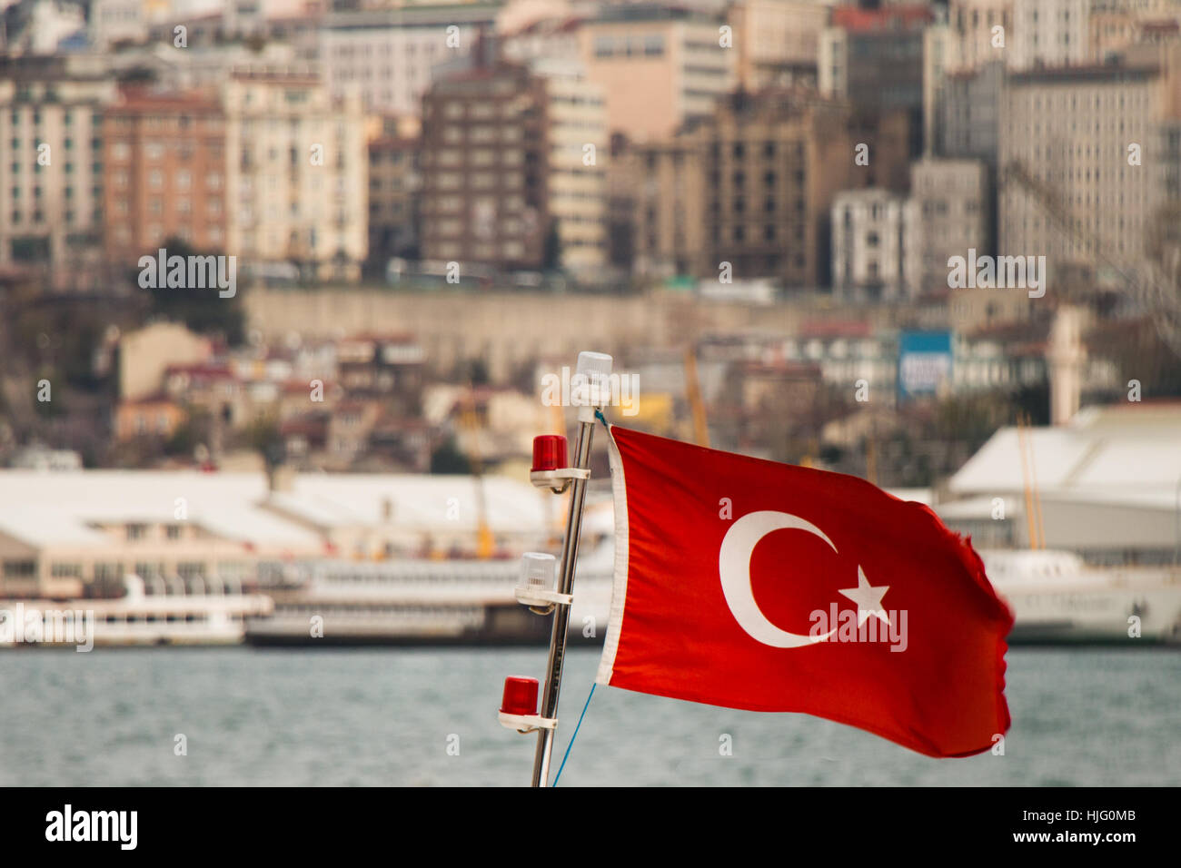 Turkish national flag hang on a pole in open air Stock Photo - Alamy