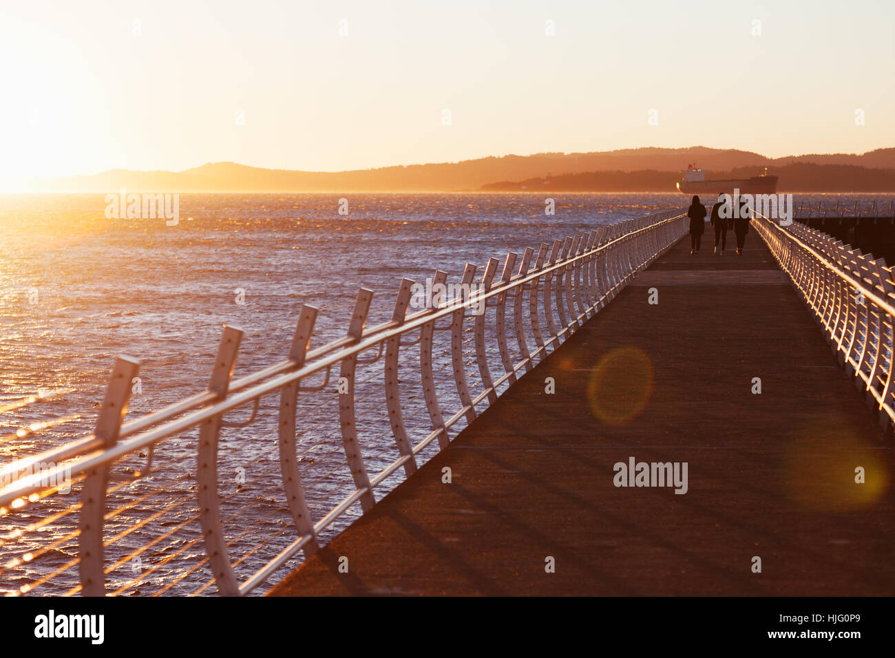 People walking at Ogden Point Pier, Victoria, BC, Canada Stock Photo ...