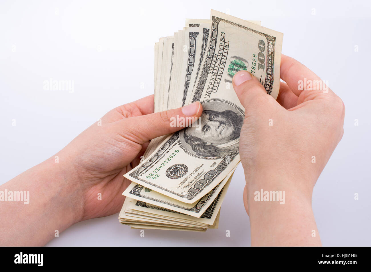 Human hand holding American dollar bill as money isolated on white ...