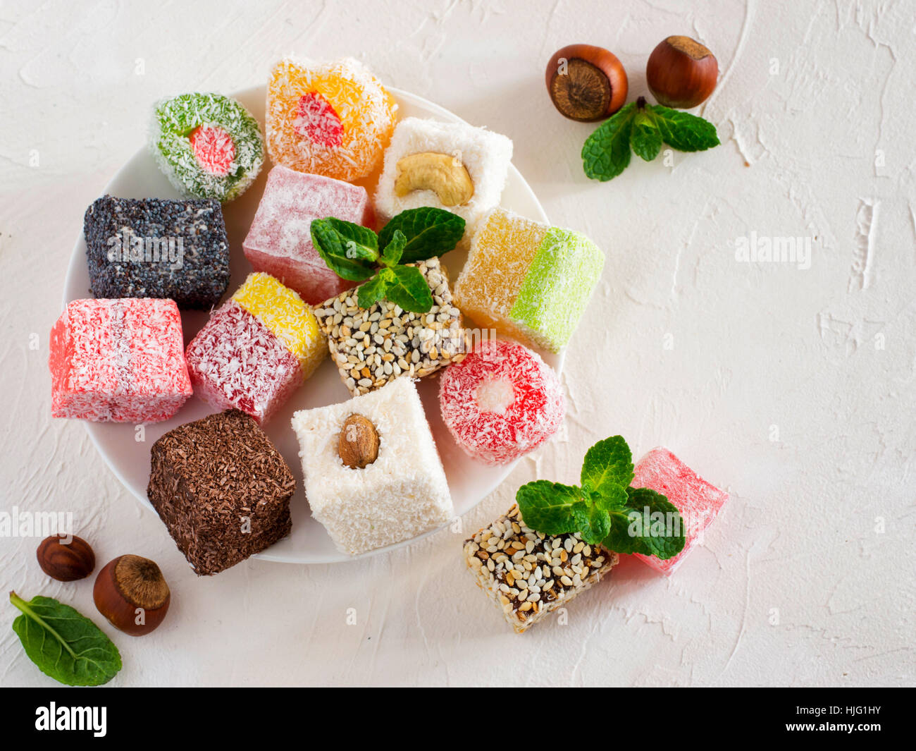 Turkish delight on white rustic background. Turkish deligh set ...