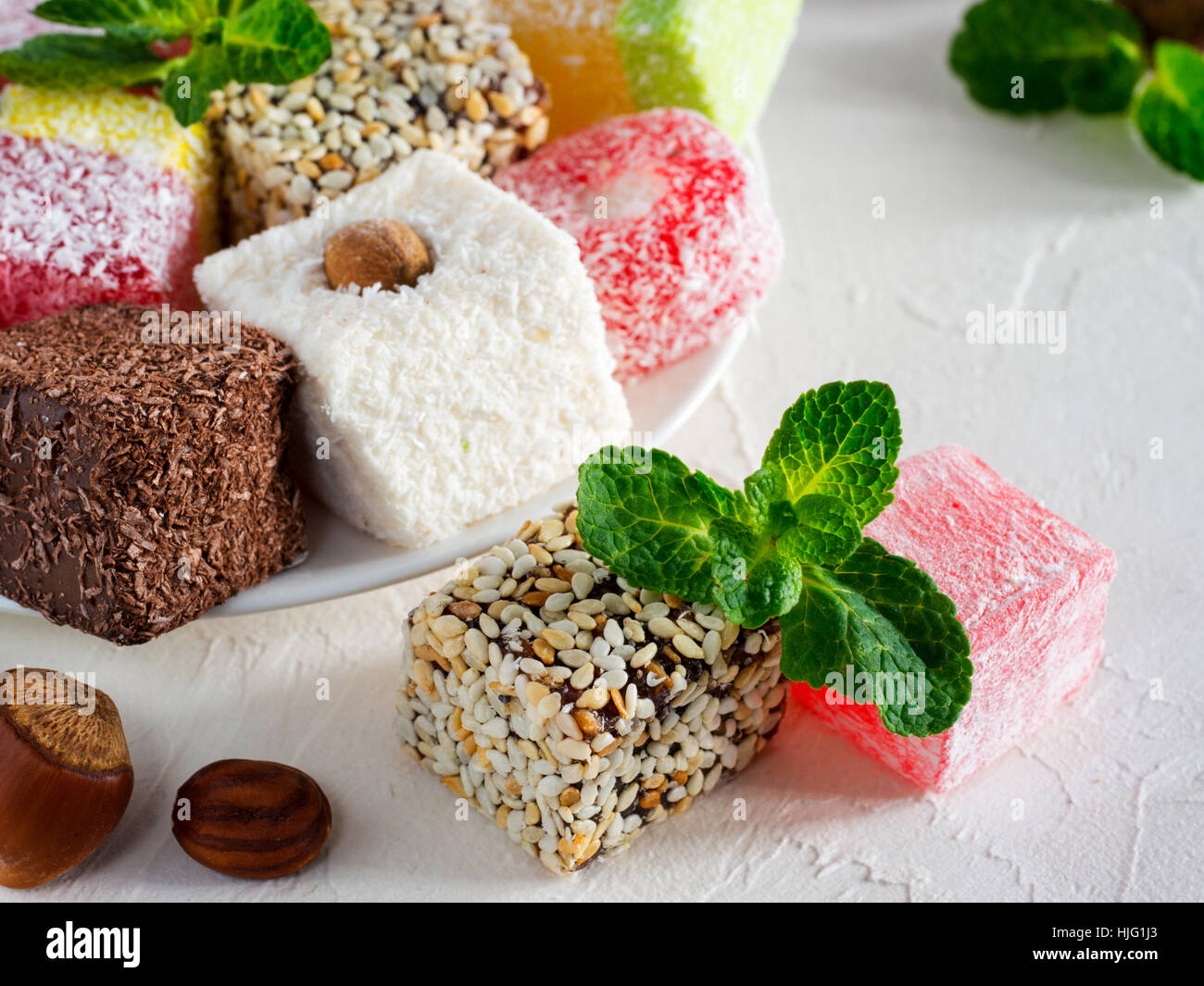 Turkish delight on white rustic background. Turkish deligh set ...
