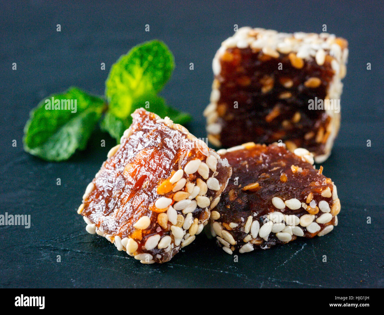 Turkish delight slice on black rustic background. Traditional turkish ...