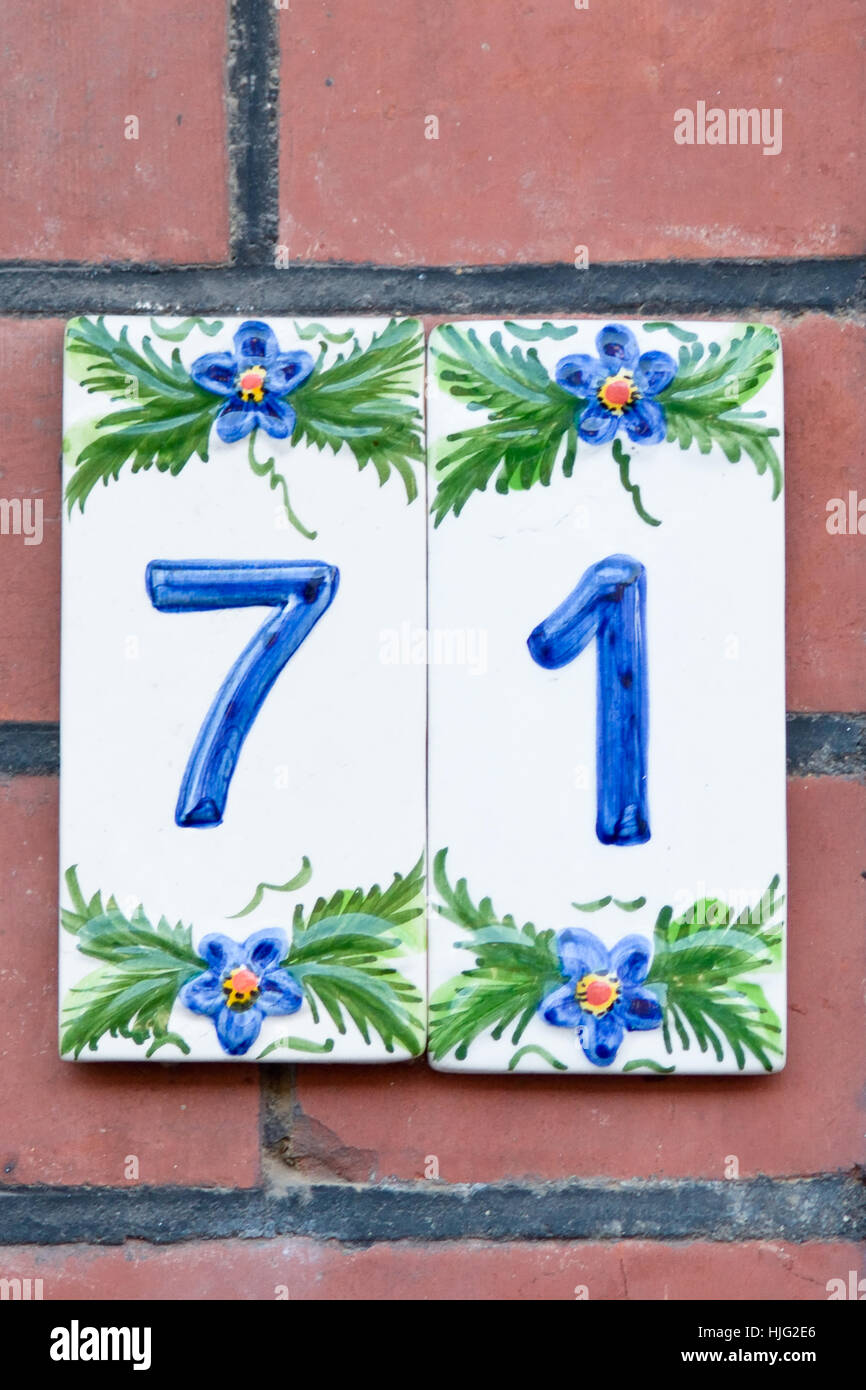House number 71 sign in flowery ceramic tiles Stock Photo - Alamy