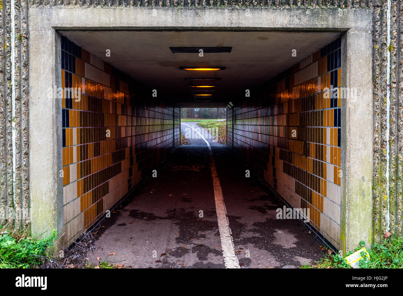 Pedestrian and ciclyst path under road Stock Photo - Alamy