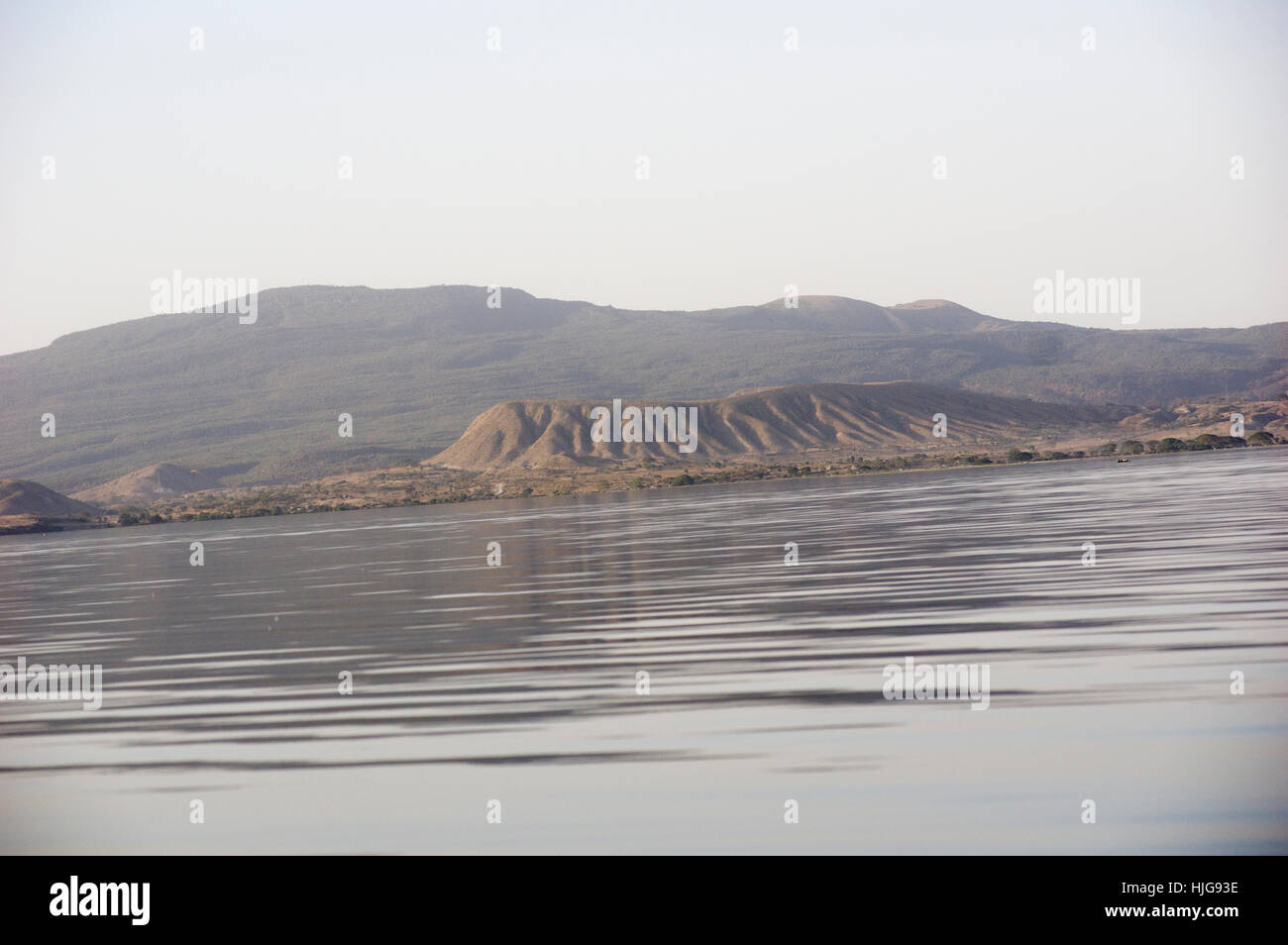 Peaceful Lake Hawassa in Ethiopia, mountains and trees in the ...