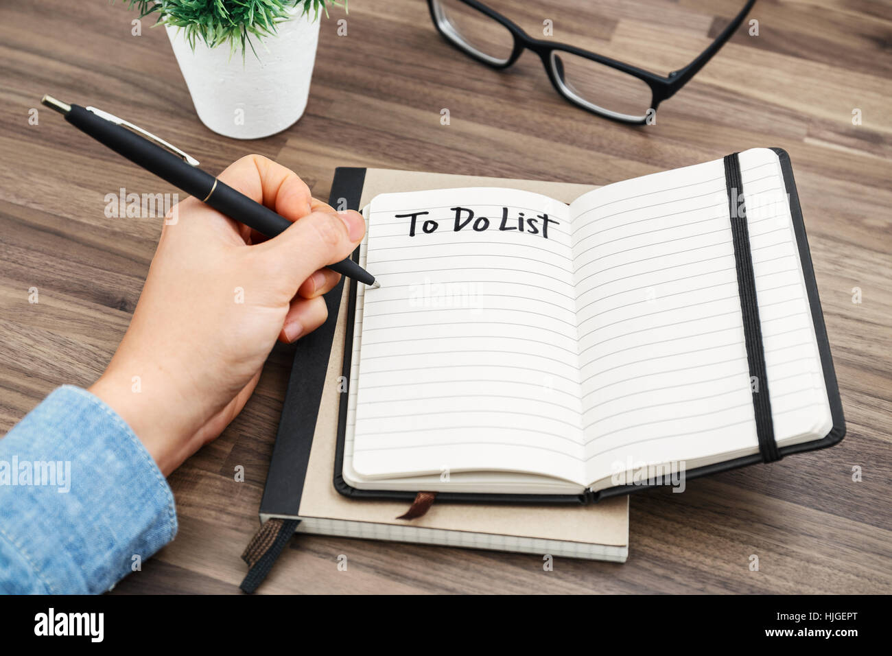 Hand woman writing notebook hi-res stock photography and images - Alamy