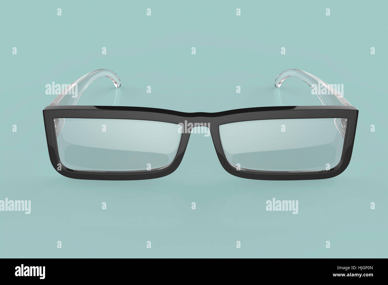 Front view of eyeglasses on green background Stock Photo - Alamy