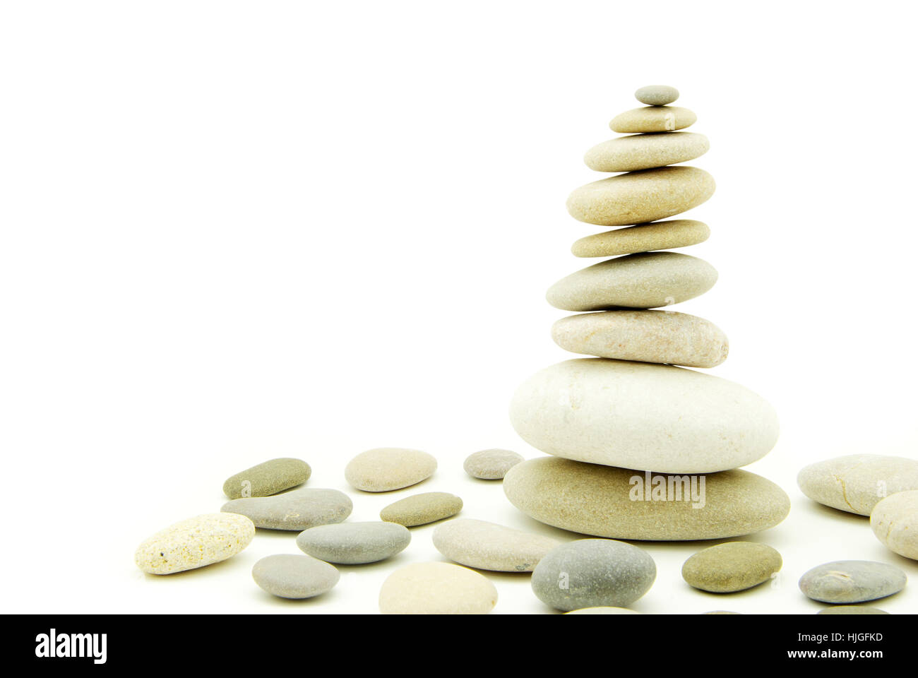 Stack of balanced stones on a white background Stock Photo - Alamy