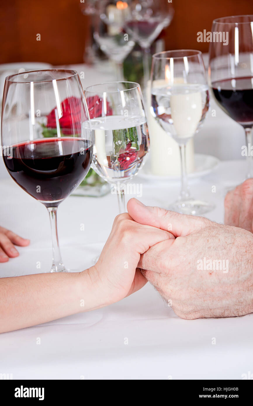 waiter serving a young couple after-dinner coffee Stock Photo - Alamy