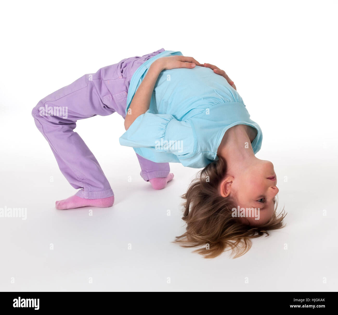 girl shows gym exercise bridge Stock Photo - Alamy