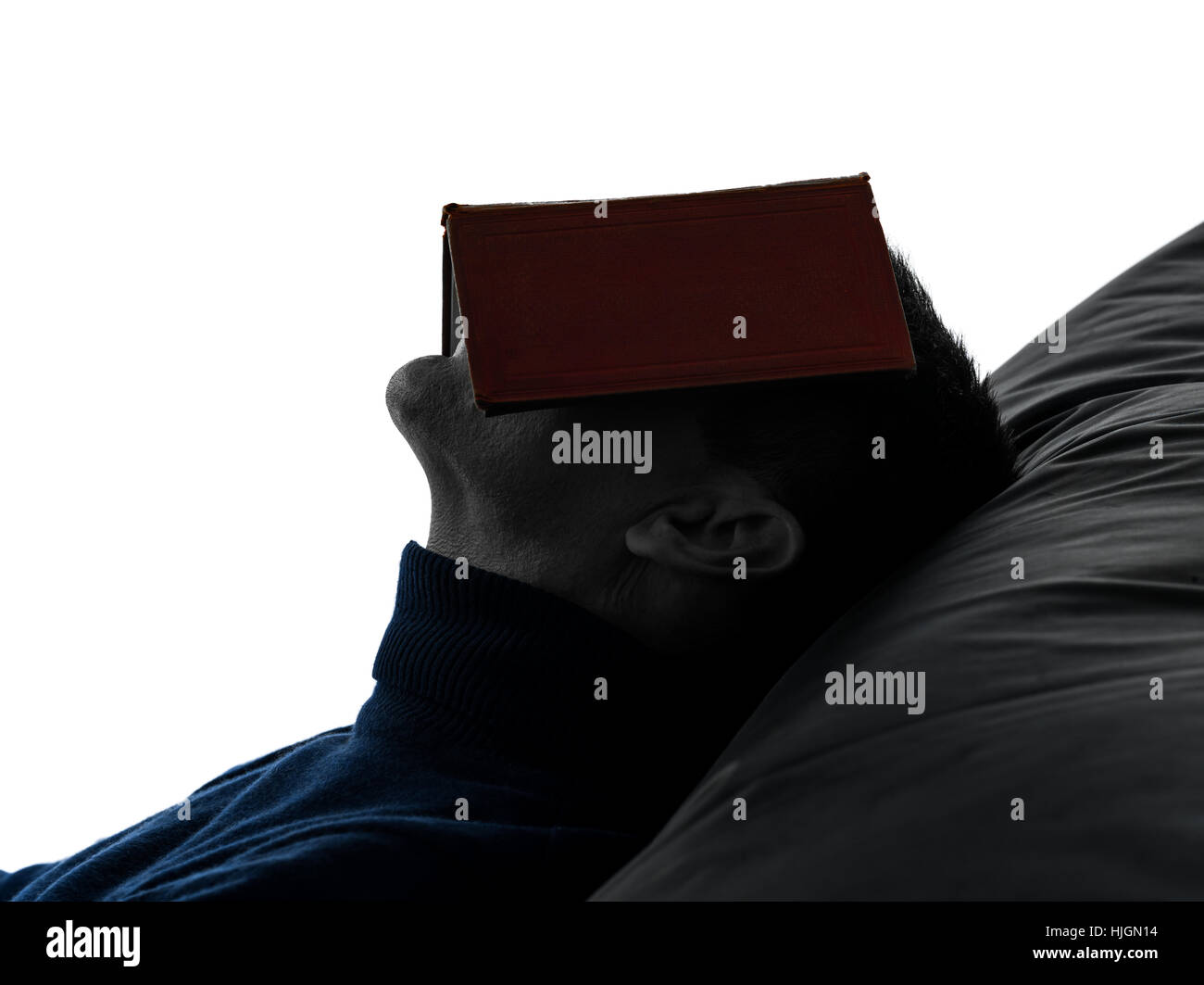 one caucasian man reading book portrait in silhouette studio isolated ...