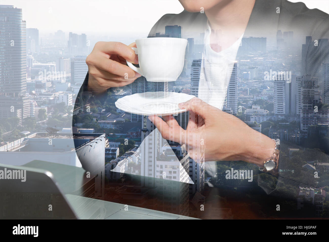 double exposure of business woman drink a coffee, tea and cityscape in ...