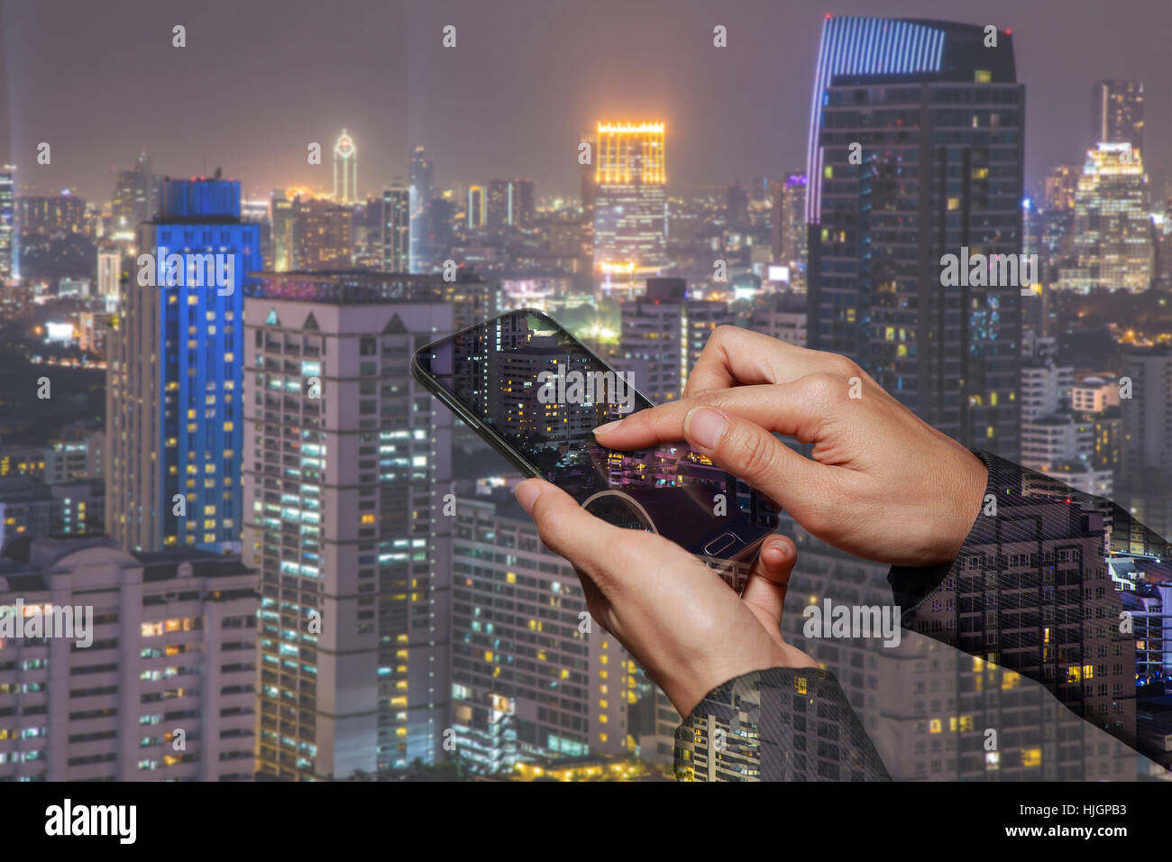 double exposure of woman hand touch screen smart phone, tablet ...