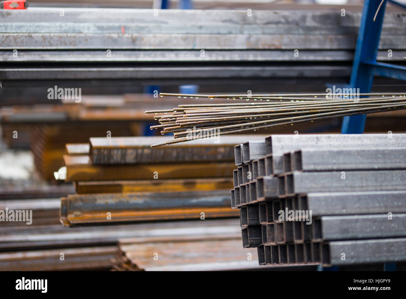 Rust steel rod or bars in outdoor warehouse Stock Photo - Alamy