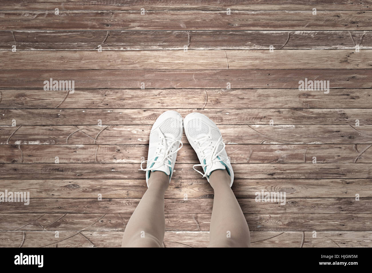 Top view of female feet wearing white sneakers hi-res stock photography ...