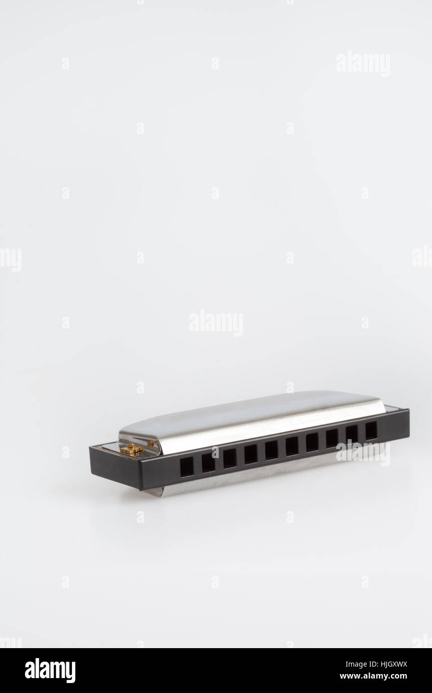 Black and silver Harmonica isolated on a white background Stock Photo ...