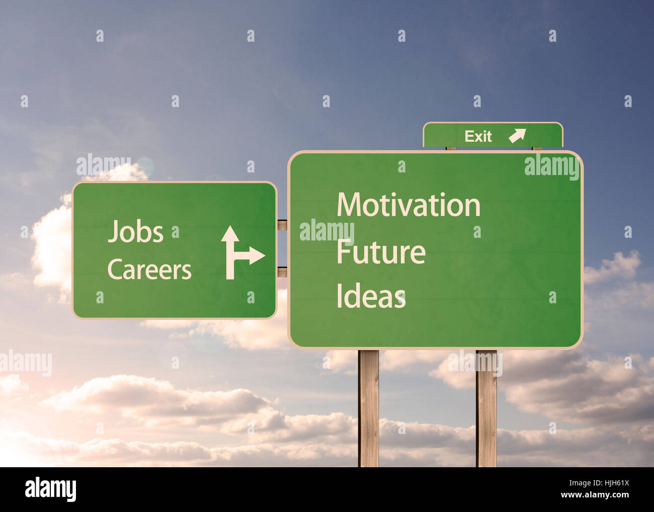 Jobs and motivation green road sign with blue sky behind Stock Photo ...