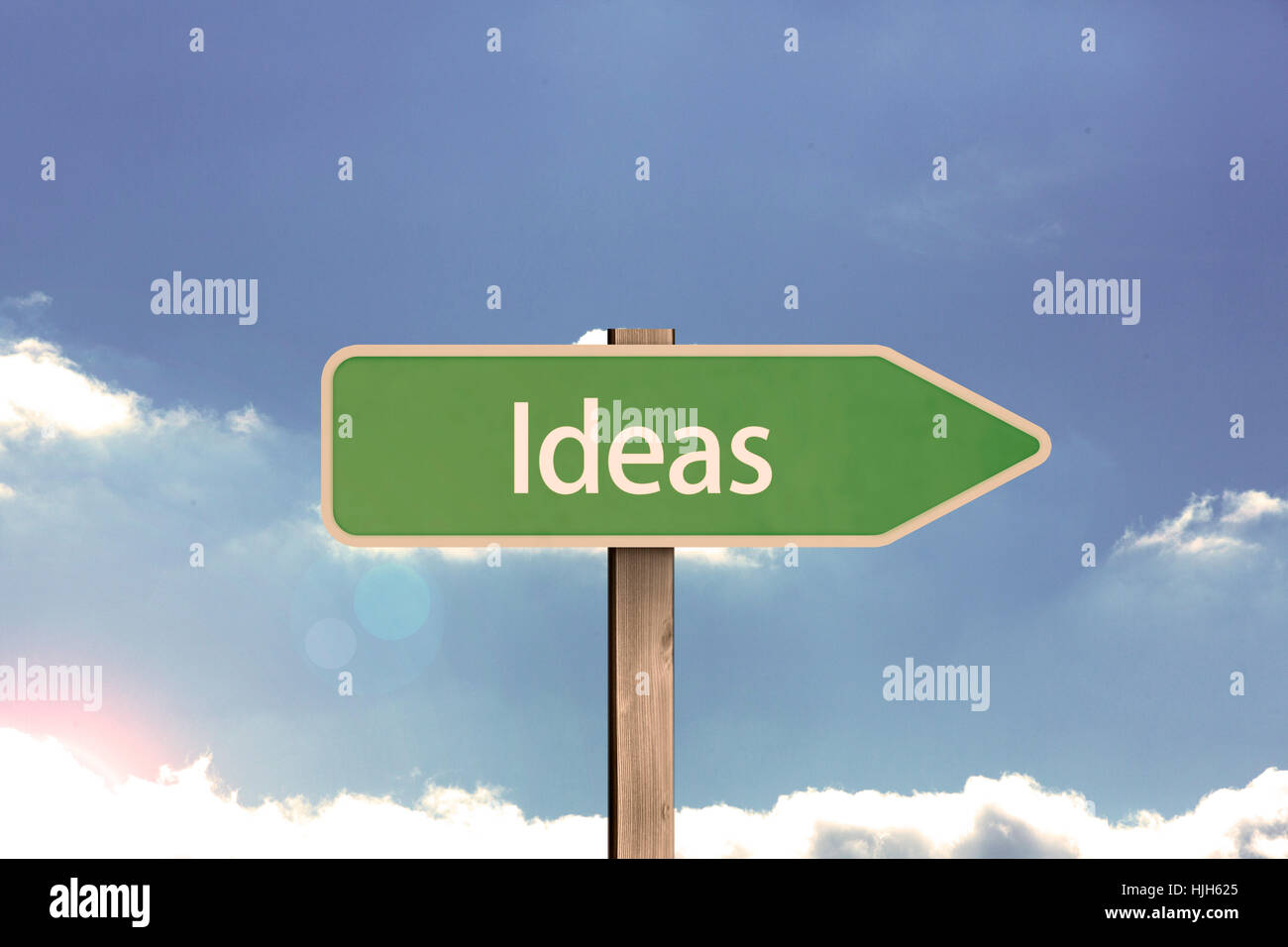 Idea road sign with blue sky behind Stock Photo - Alamy