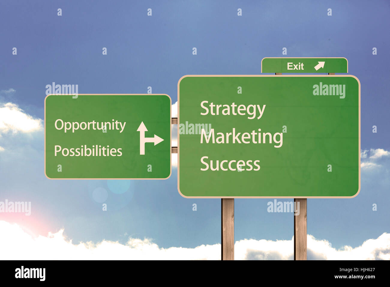 Opportunity and strategy green road sign with blue sky behind Stock ...