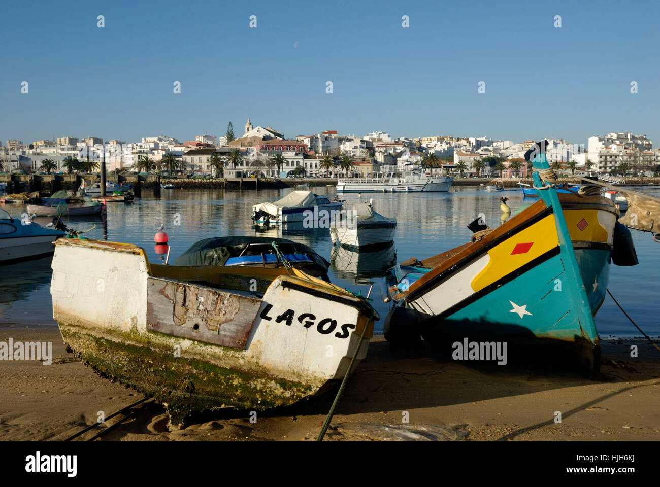 fishing boats at dock in lagos Stock Photo - Alamy
