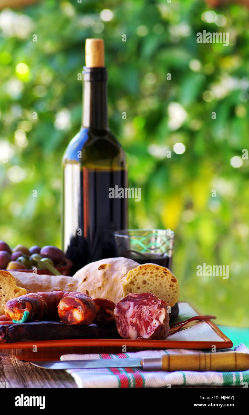 wine, plate, bottle, slice, table, arm, weapon, knive, knife, pork, pig ...