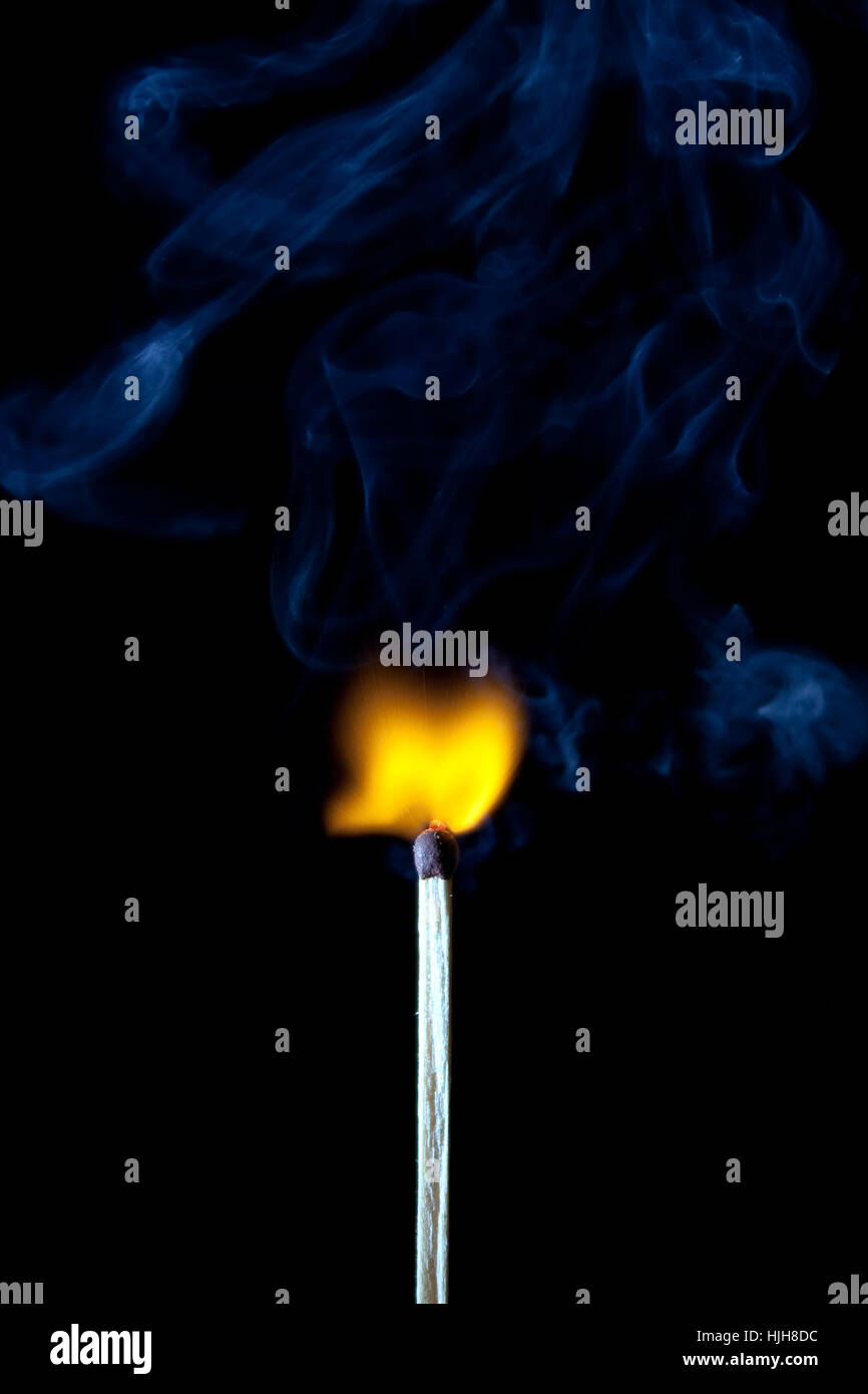 match burning with fire and smoke isolated on black background Stock ...