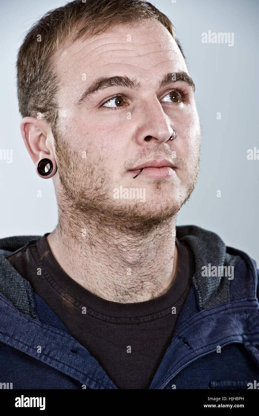 young alternative man with piercing Stock Photo - Alamy
