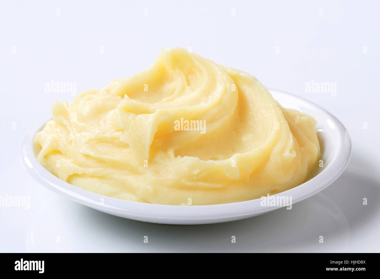 Plate of ready-to-eat mashed potato - studio Stock Photo - Alamy