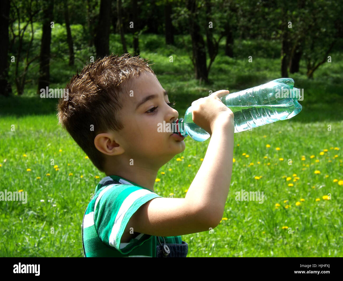 Sweaty kid drinking water hi-res stock photography and images - Alamy