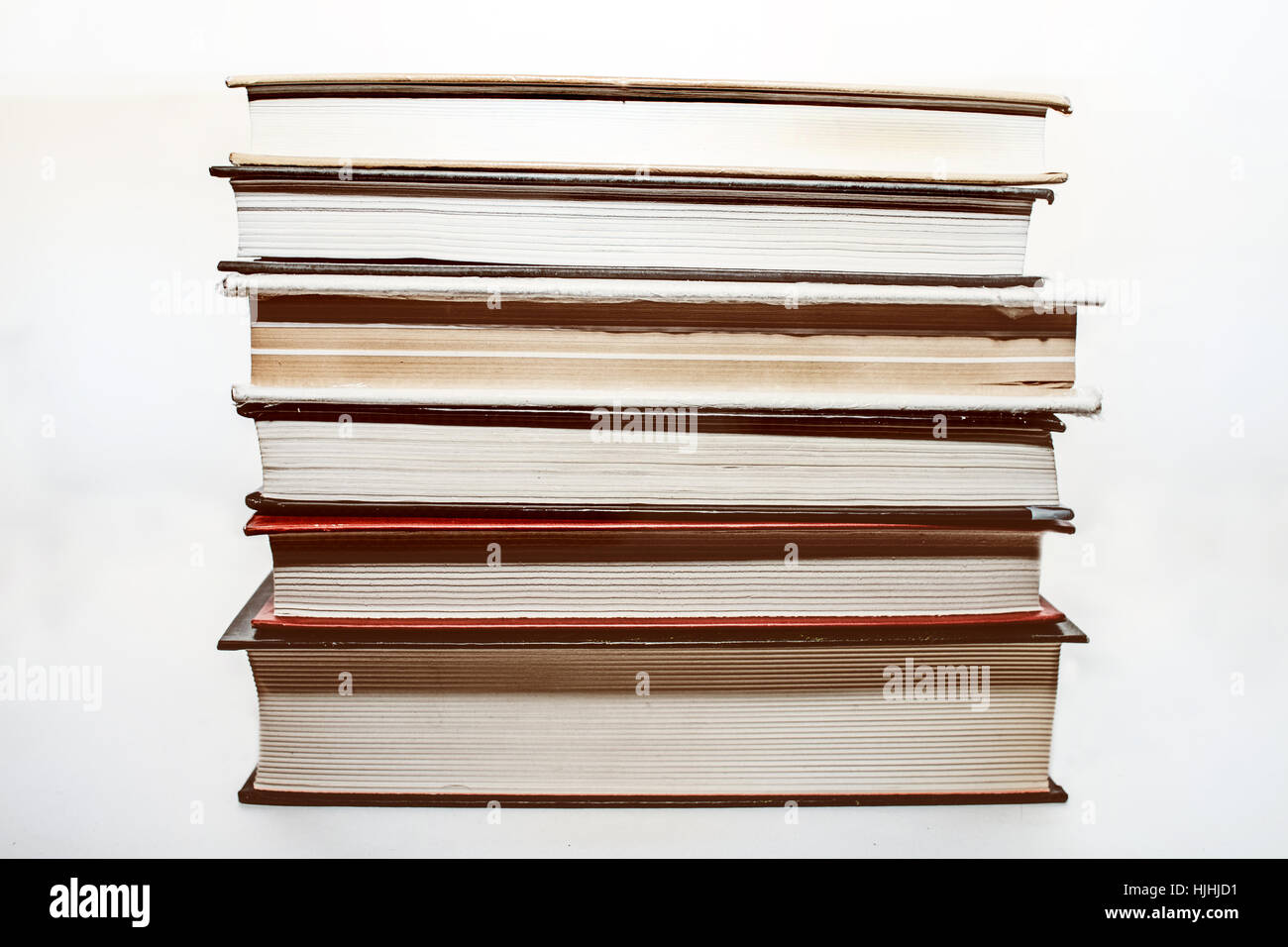 Six old books isolated on white background Stock Photo - Alamy