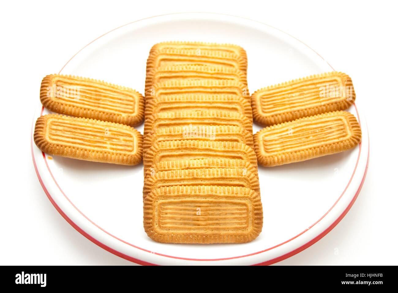biscuit biscuits on plastic plate Stock Photo - Alamy