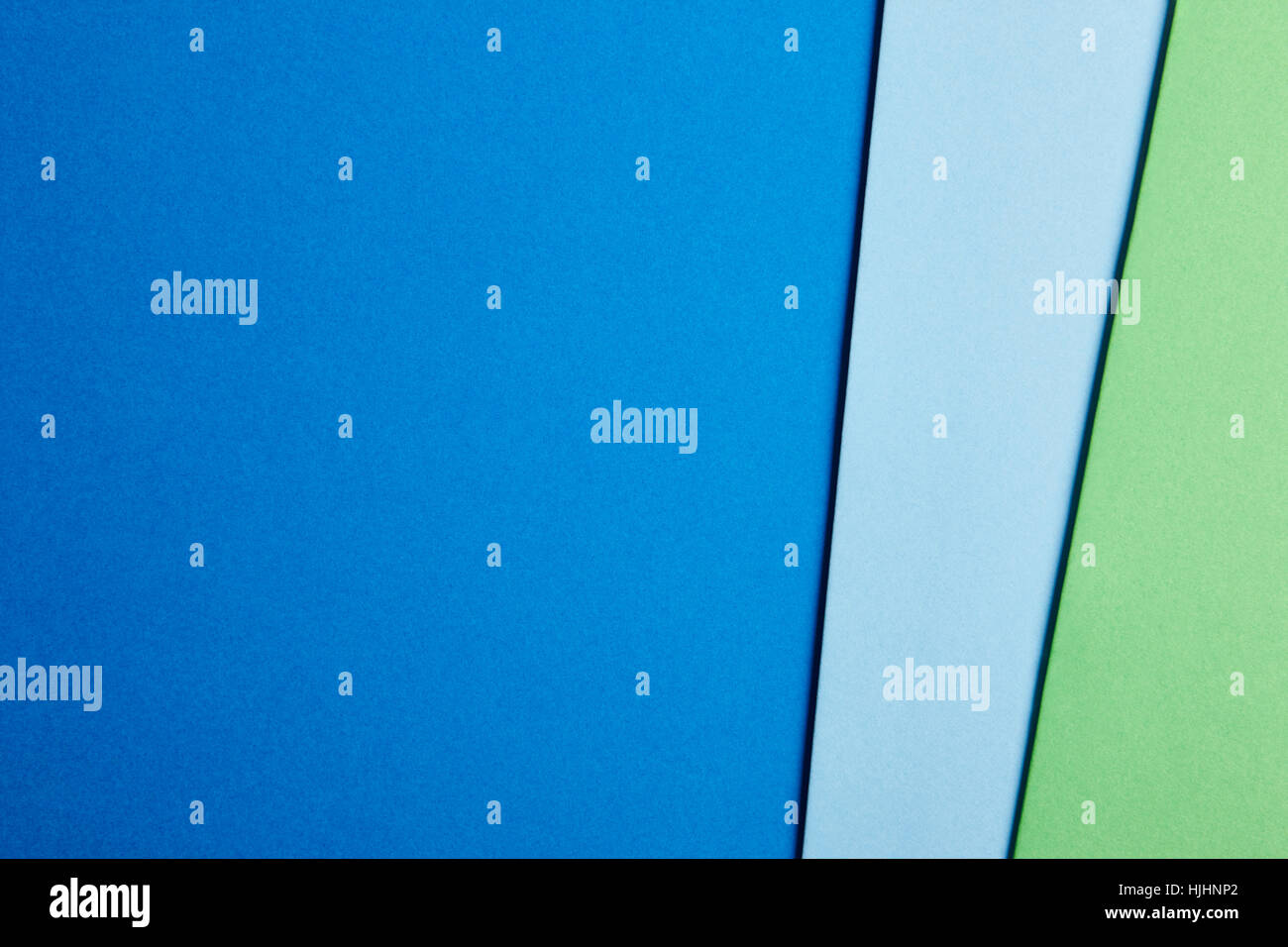 Colored cardboards background in blue green tone. Copy space ...