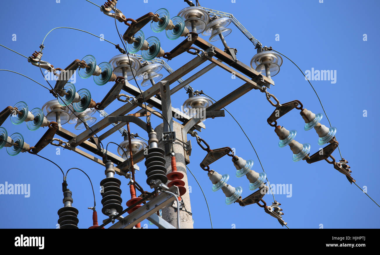 big switches of a high voltage power line with concrete pole and ...