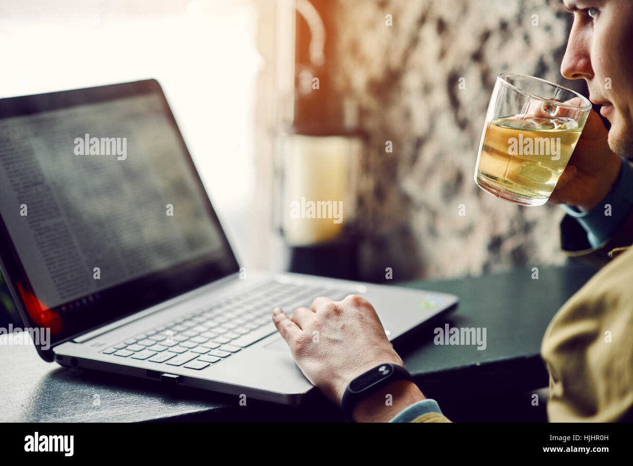 Guy drinking tea in cafe hi-res stock photography and images - Alamy