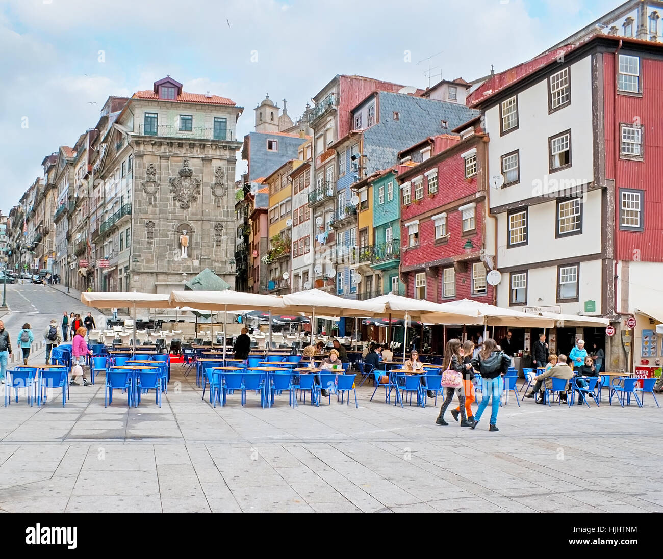 PORTO, PORTUGAL - APRIL 30, 2012: The Ribeira Square with many outdoor ...