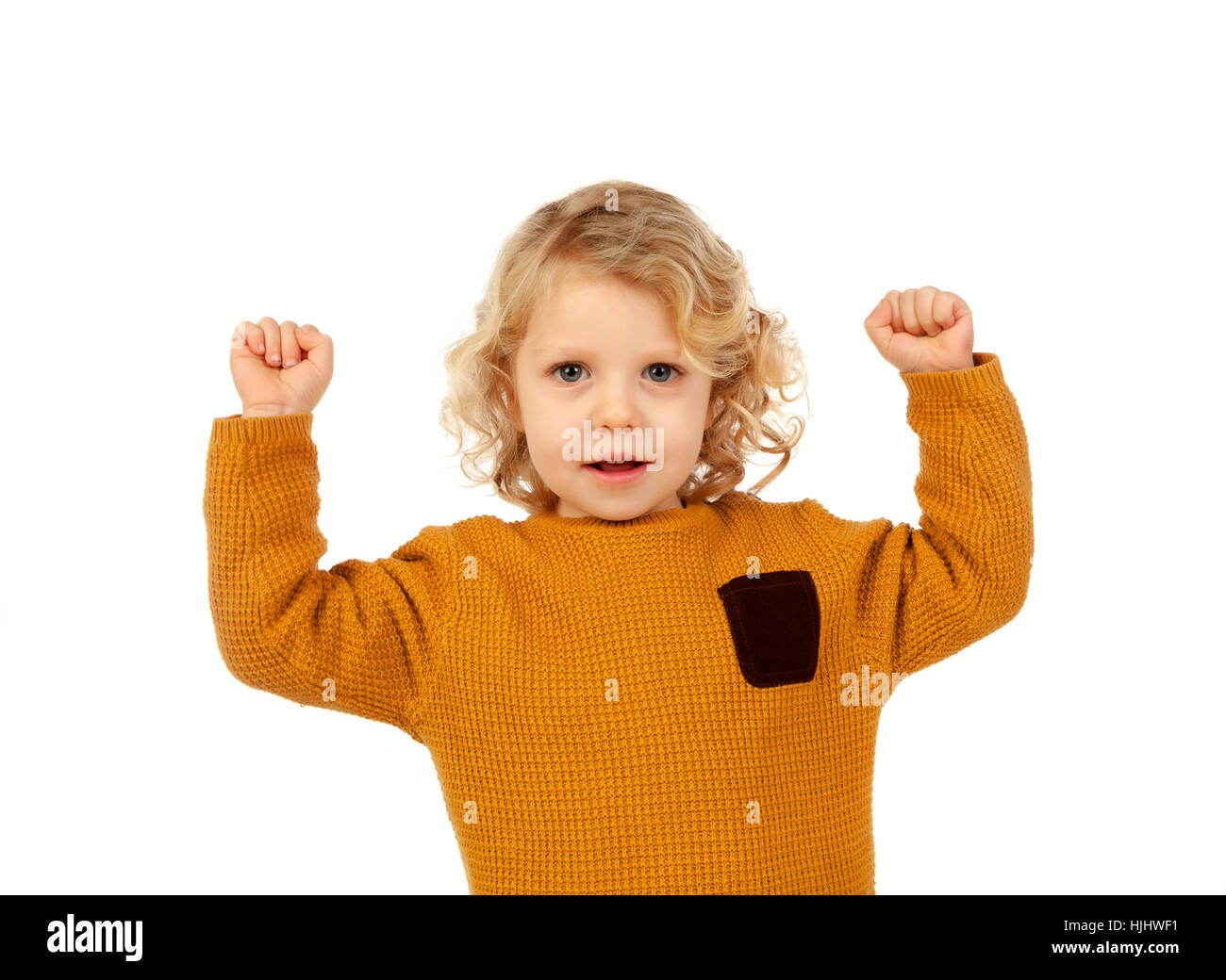 Happy small kid raising his arms isolated on a white background Stock ...